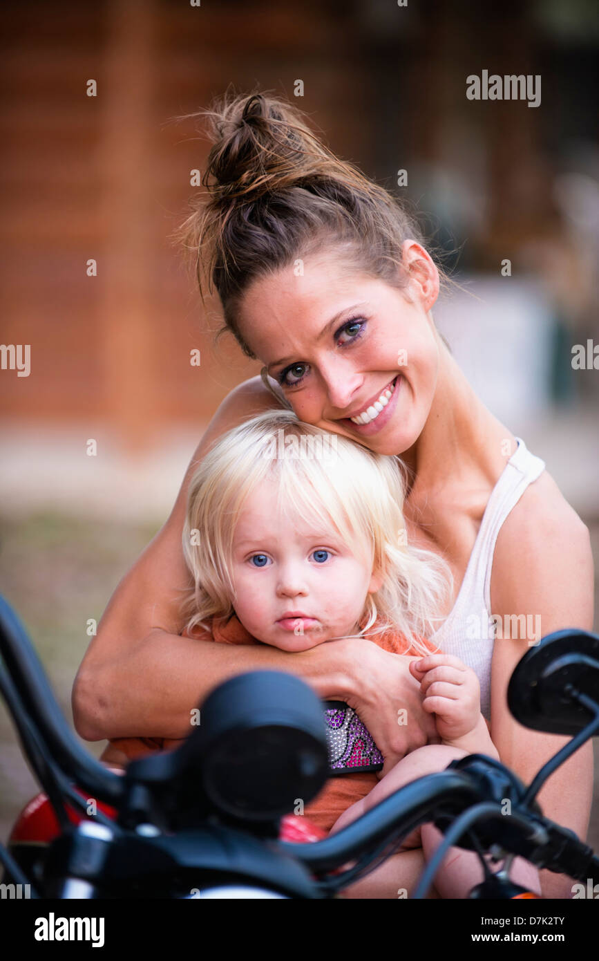 Girl sitting on motorcycle hi-res stock photography and images - Alamy