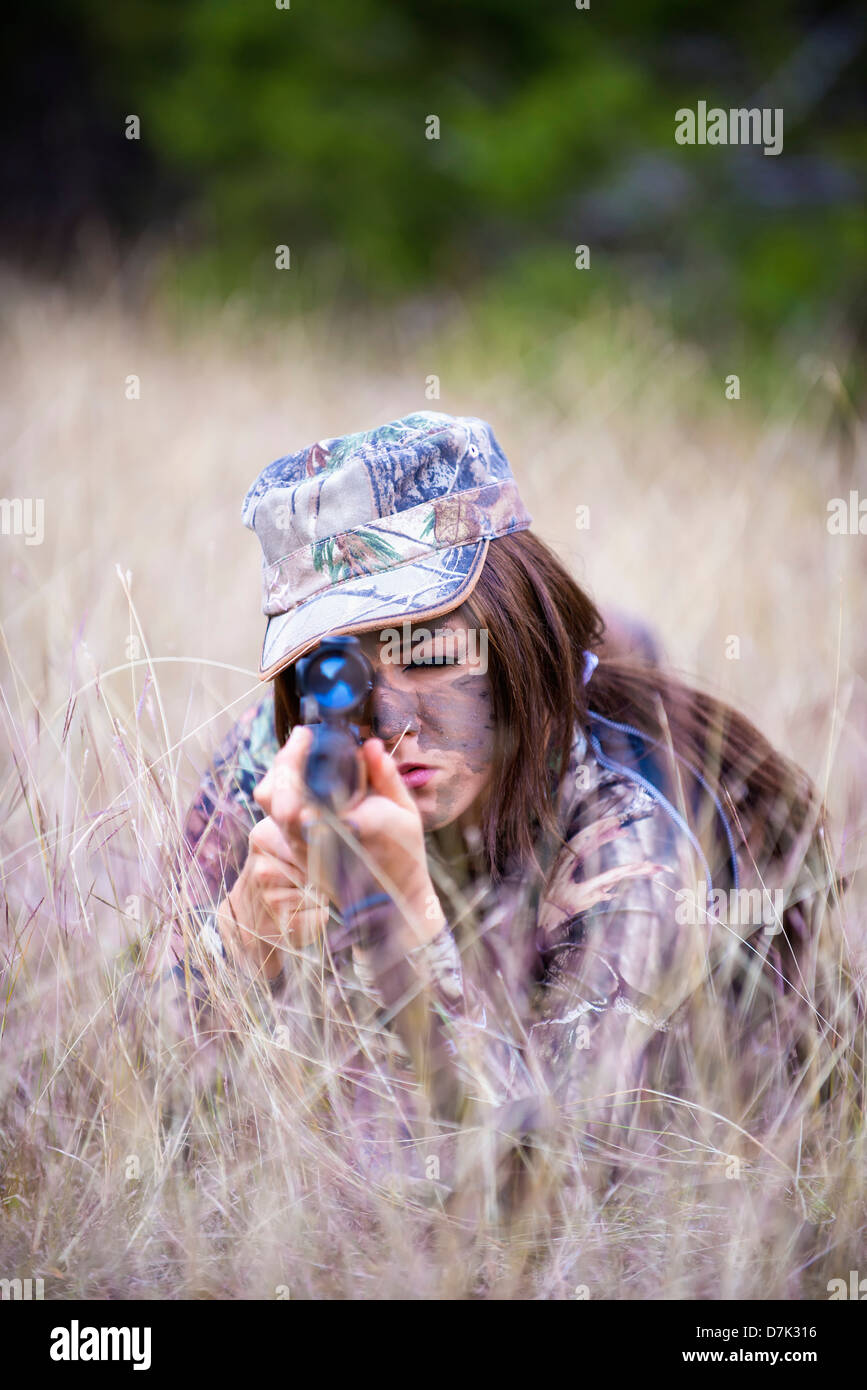 USA, Texas, Young woman with hunting rifle Stock Photo - Alamy
