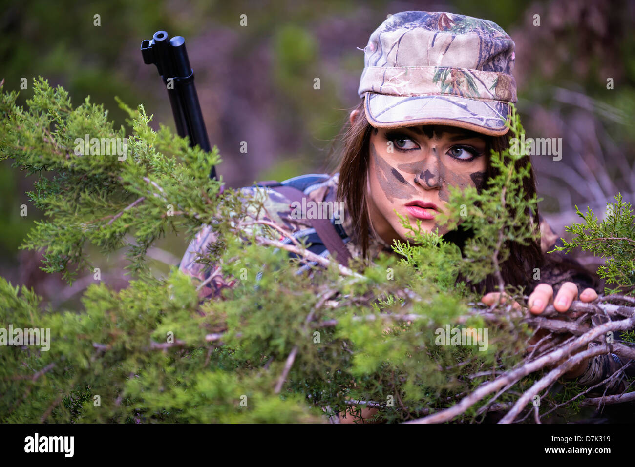 USA, Texas, Young woman with hunting rifle, smiling Stock Photo - Alamy