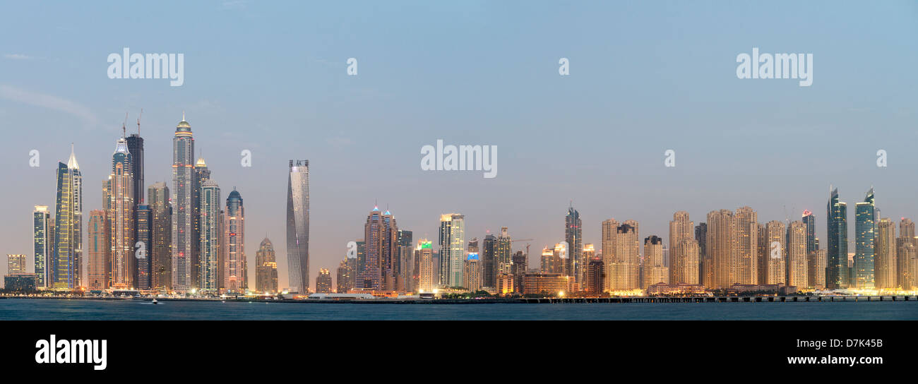 Dusk skyline panorama of high-rise apartment buildings at Marina and ...