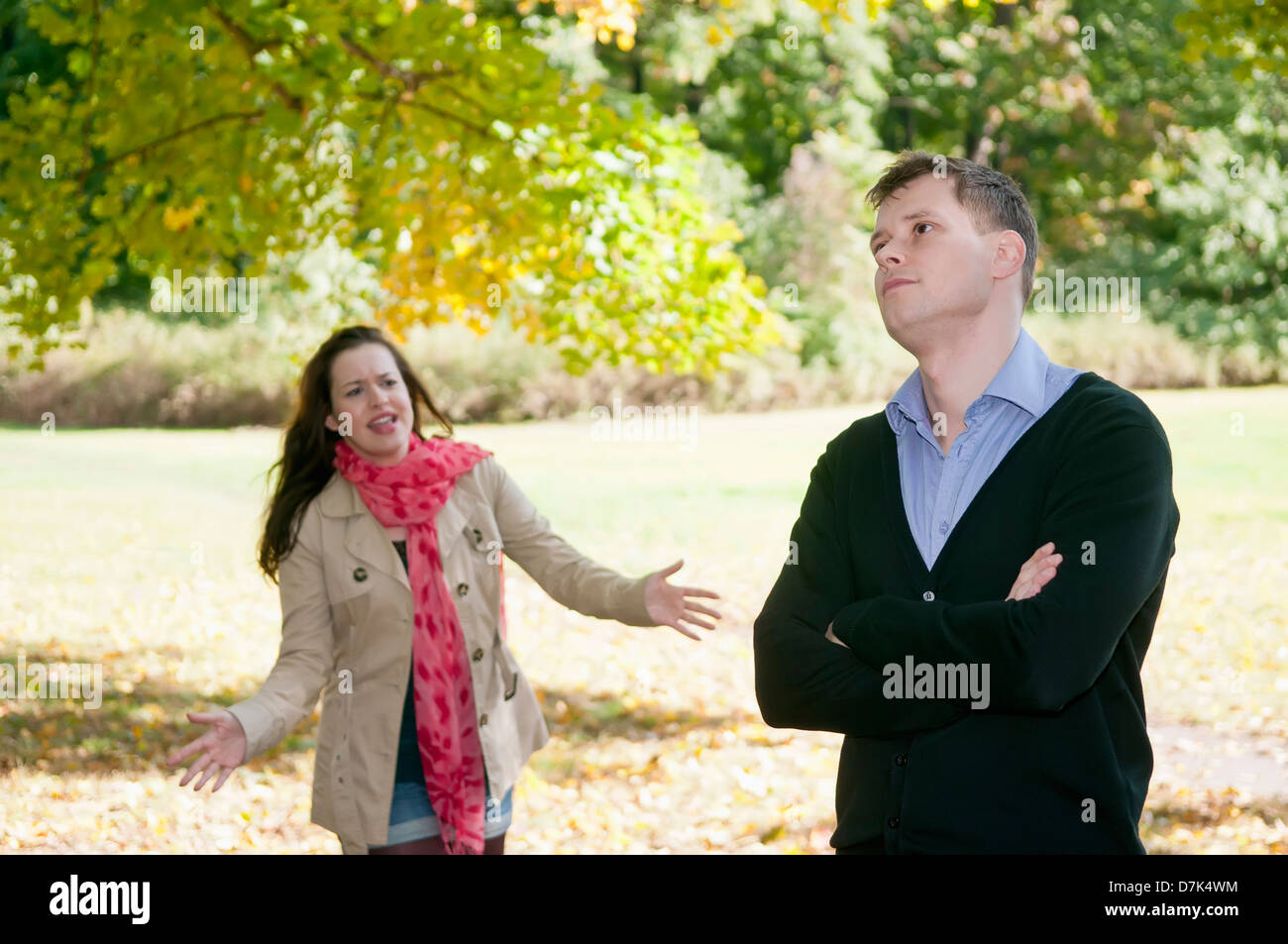 Germany, Berlin, Couple argueing in autumn park Stock Photo - Alamy