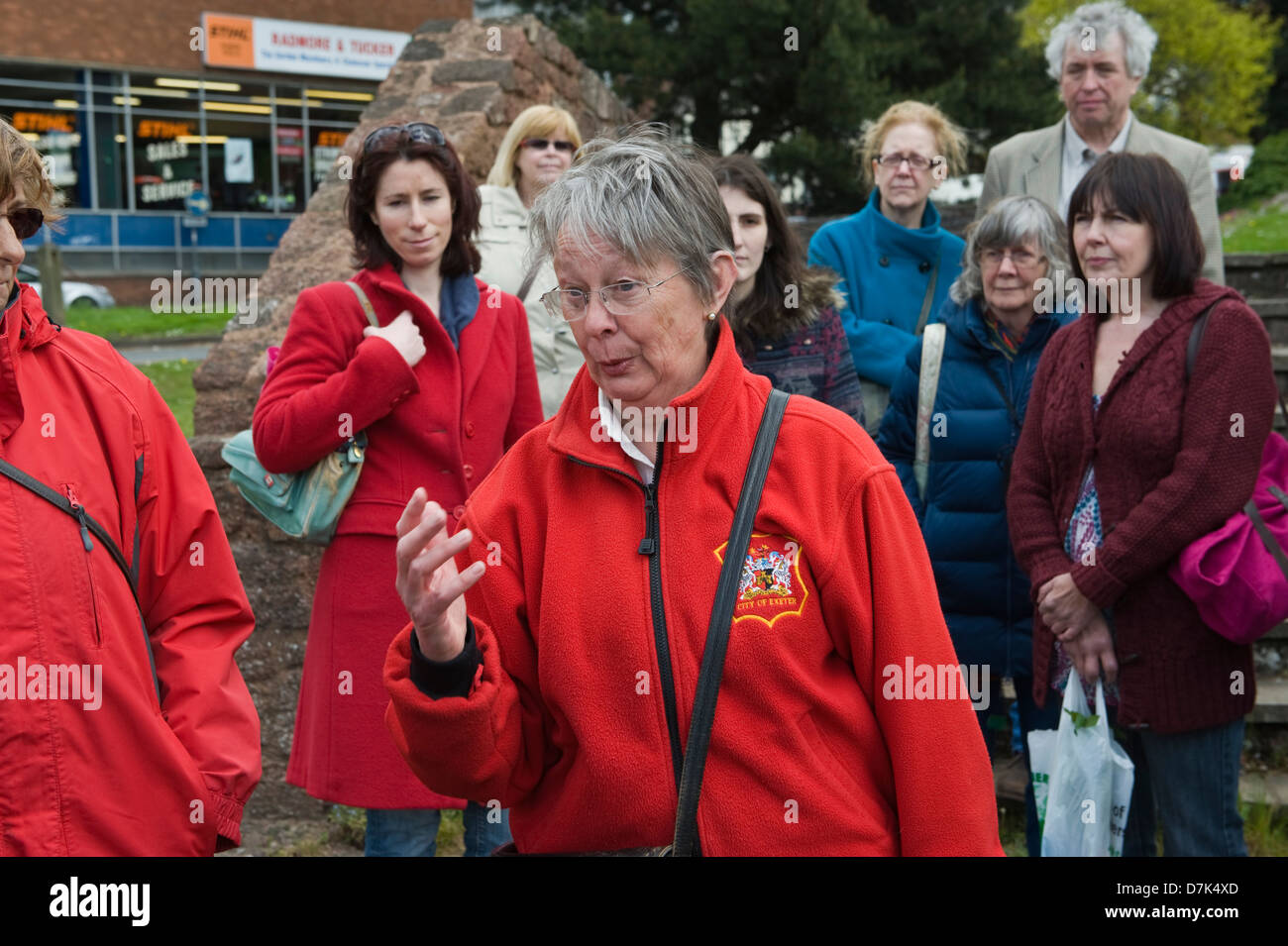 Red Coat Guide giving tour of historic sites in Exeter Devon England UK ...