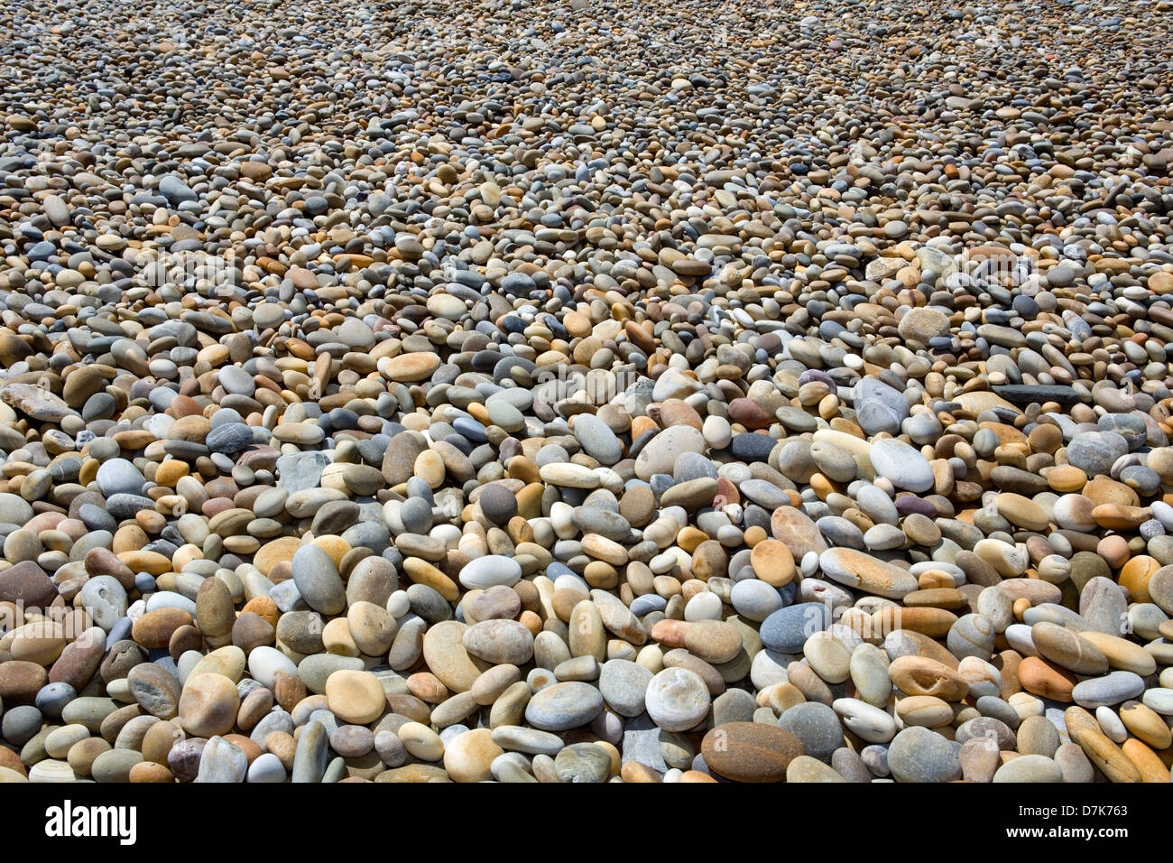 colorful pebble stone background, at the beach Stock Photo - Alamy