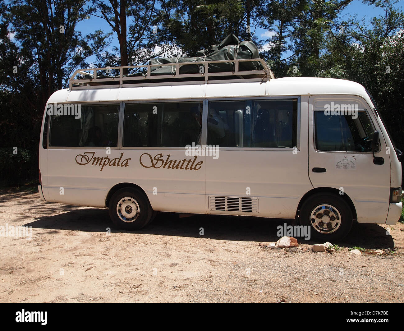 Impala shuttle bus is waiting for tourists Stock Photo - Alamy