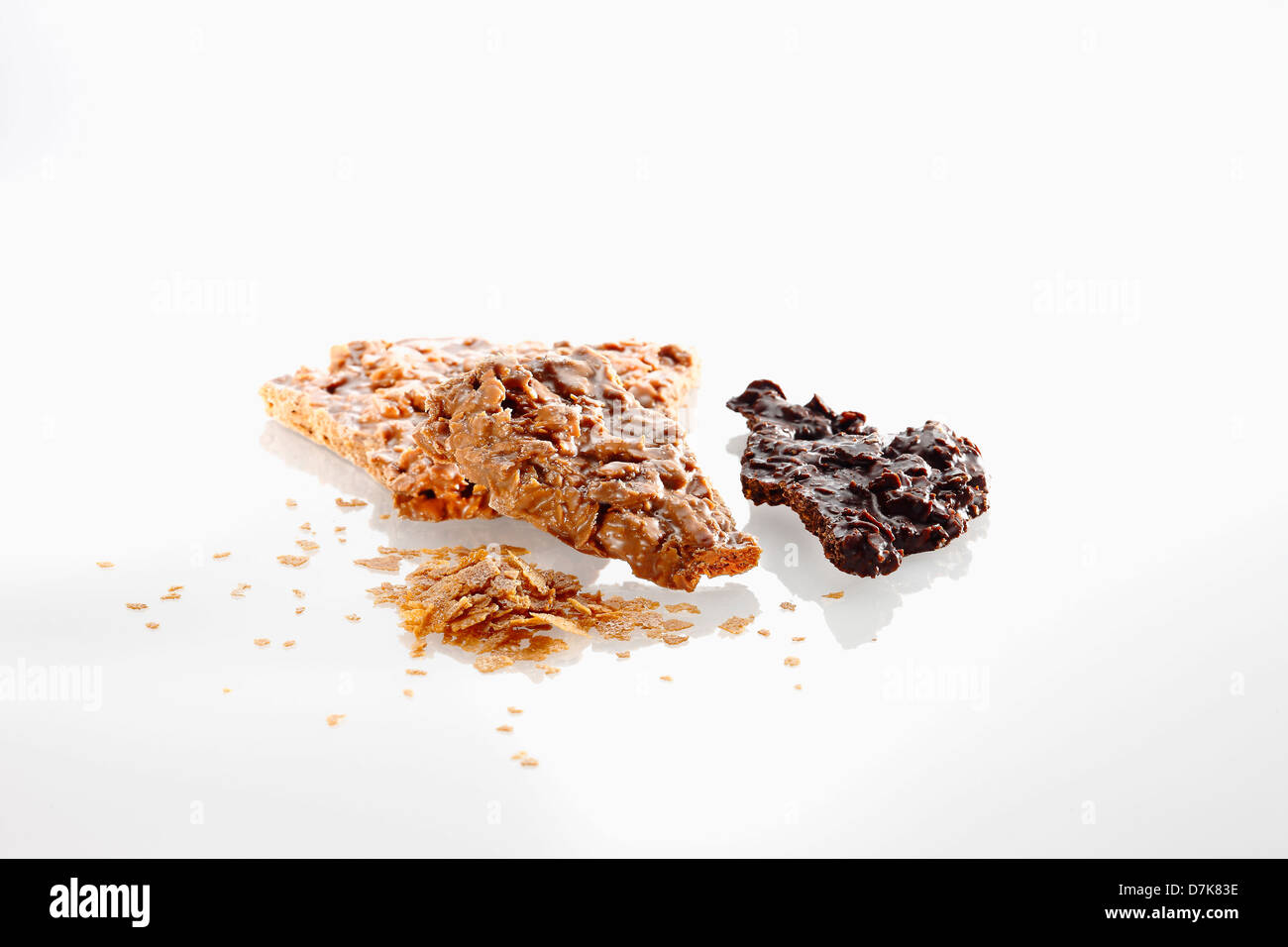 Variety of chocolates with flakes on white background Stock Photo - Alamy