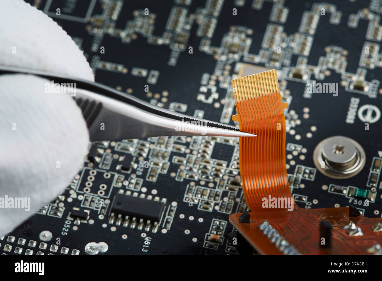 Human hand repairing printed circuit board, close up Stock Photo - Alamy