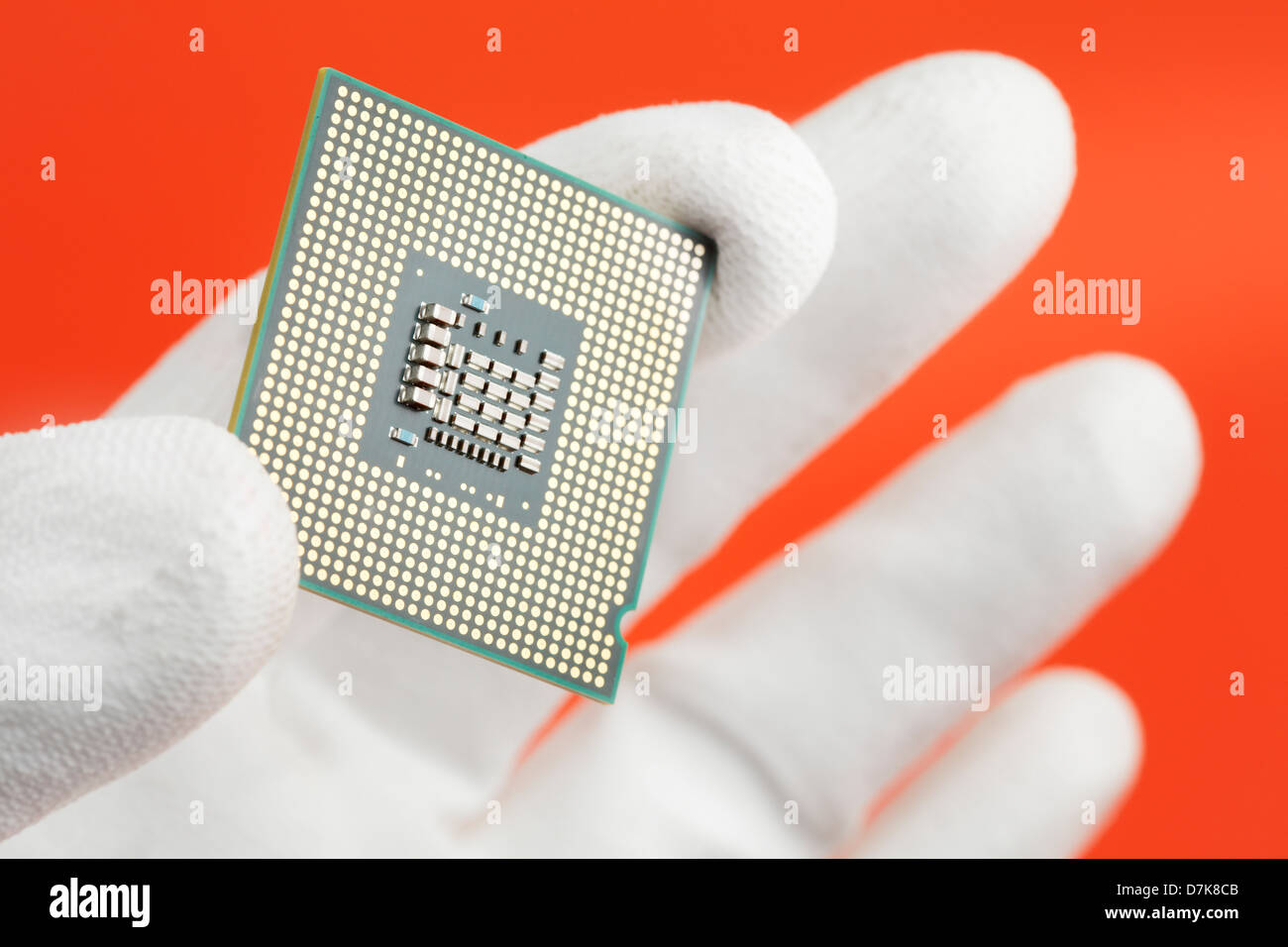 Human hand holding integrated circuit Stock Photo - Alamy