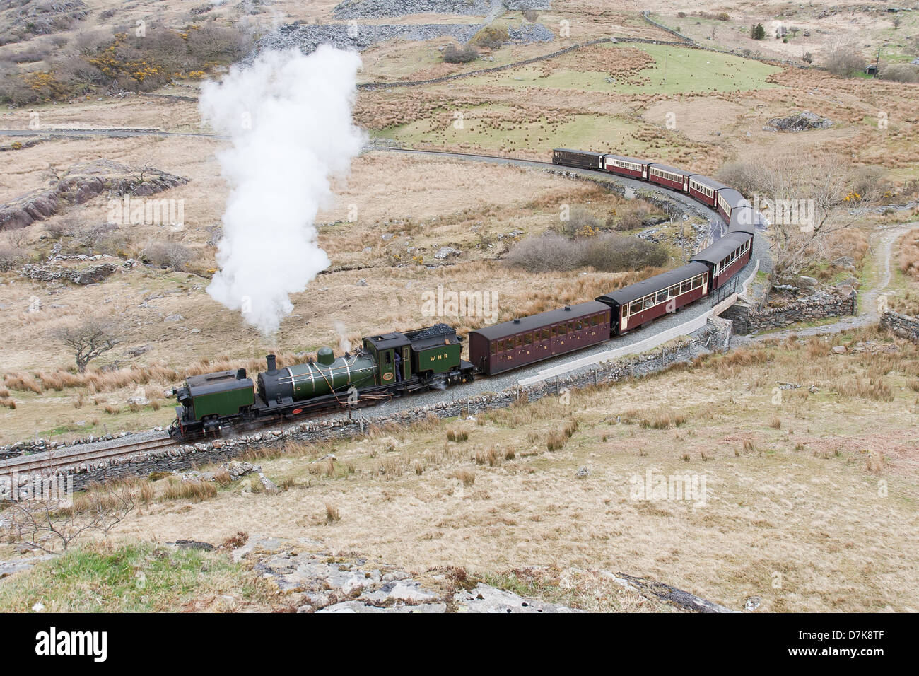 Steam locomotive pulling a passenger train on Welsh Highland line ...