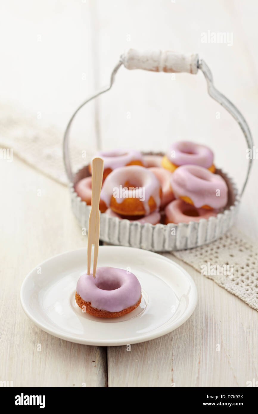 Glazed baked doughnuts on tray and plate Stock Photo - Alamy