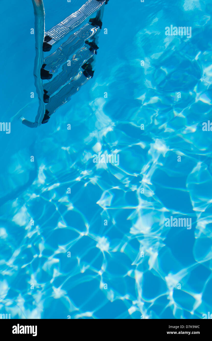 Italy, Swimming pool with ladder Stock Photo - Alamy