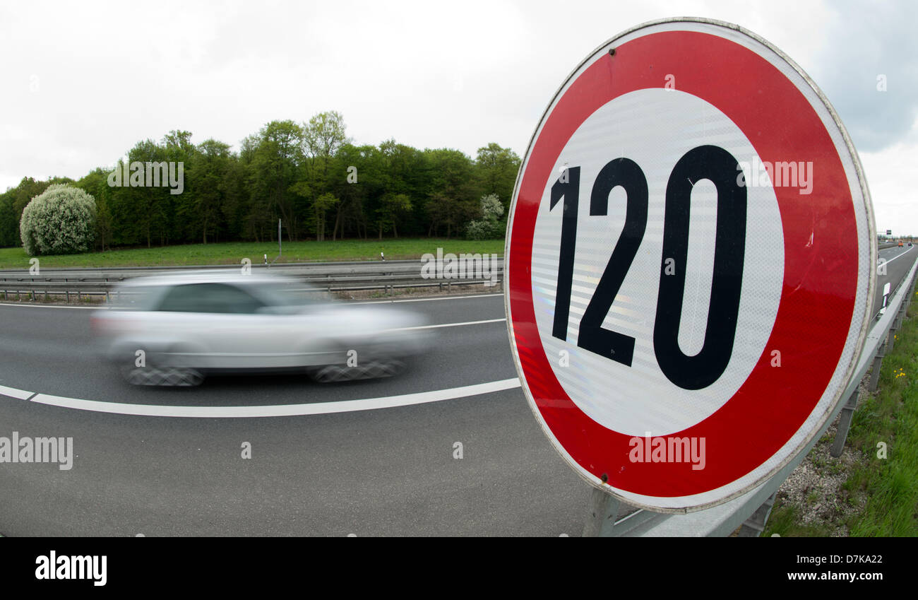 A traffic sign displays a speed limit of 120 km/h on the highway A37 ...