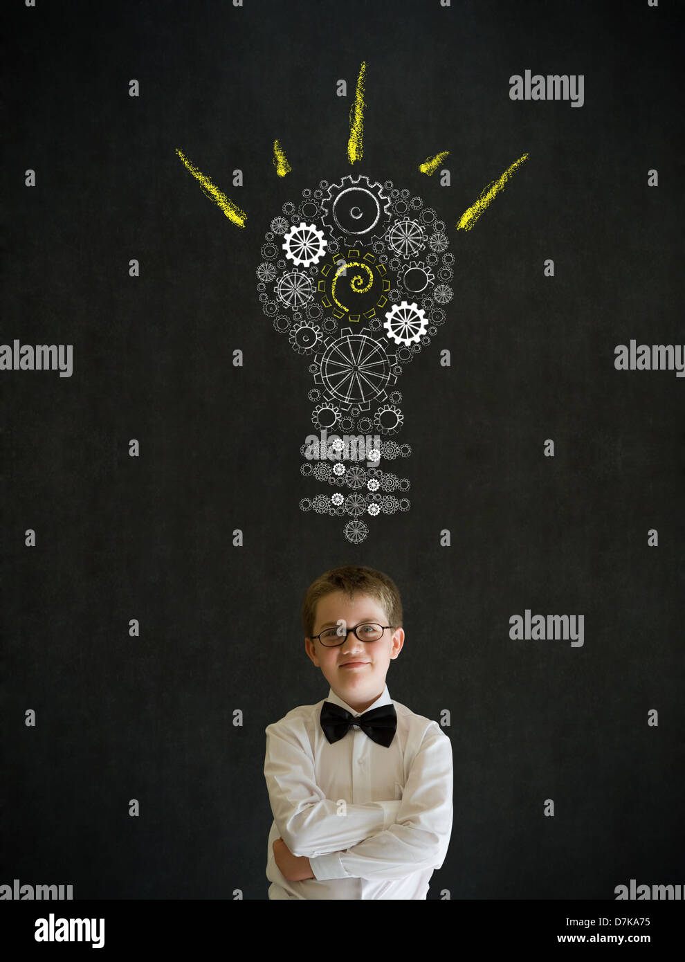 Thinking boy dressed up as business man with bright idea gear cog ...
