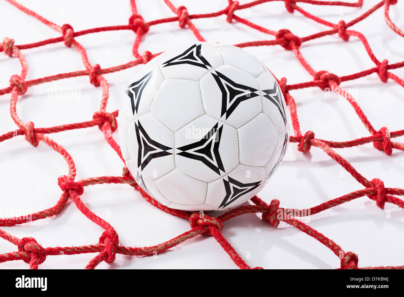Football on red net, close up Stock Photo - Alamy