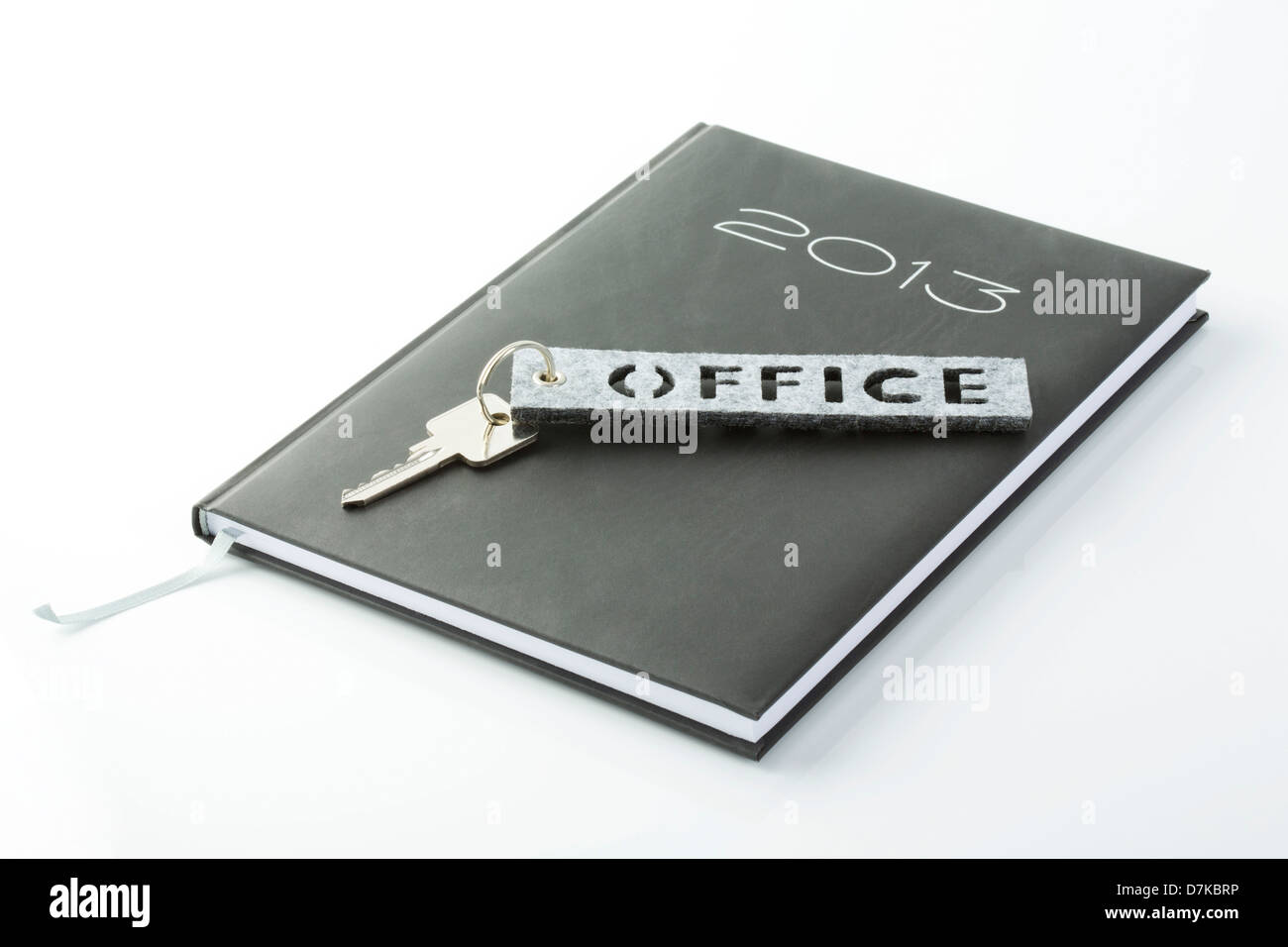 Close up of office key and appointment book on white background Stock ...