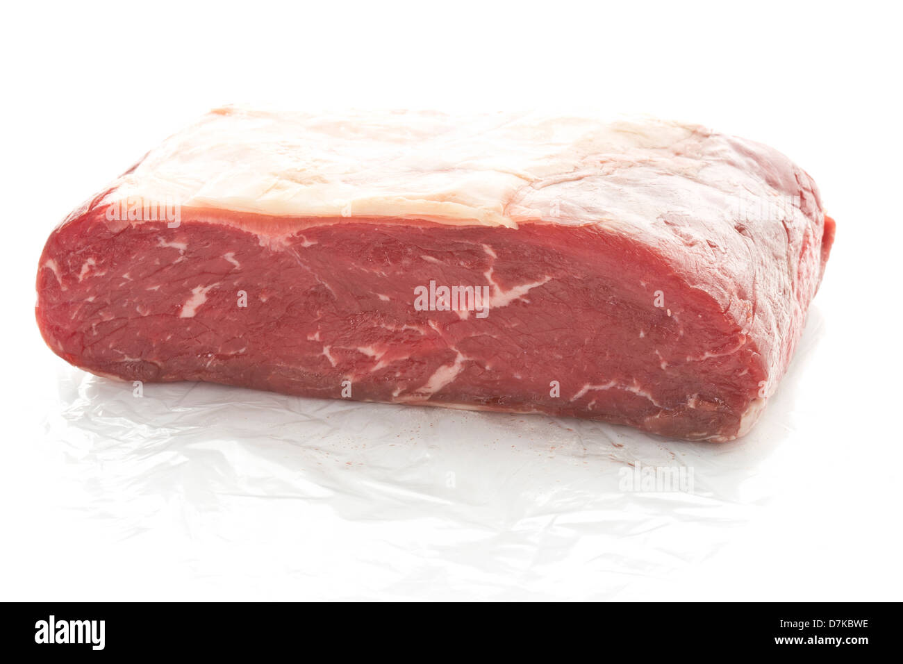 Raw beef on white background, close-up Stock Photo - Alamy