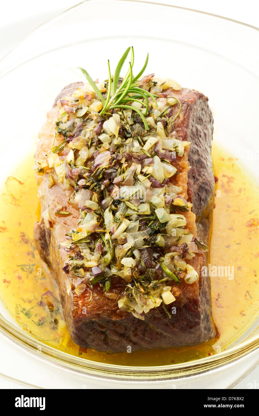 Bowl of roast beef on plate, close up Stock Photo - Alamy