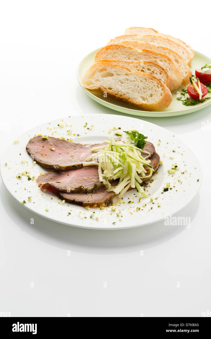 Garnished cold roast beef on plate hi-res stock photography and images ...