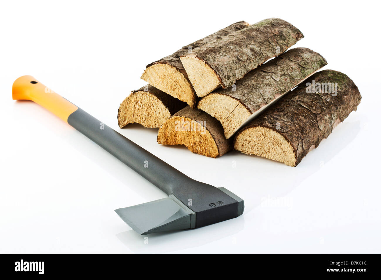 Axe with wood stack Stock Photo - Alamy