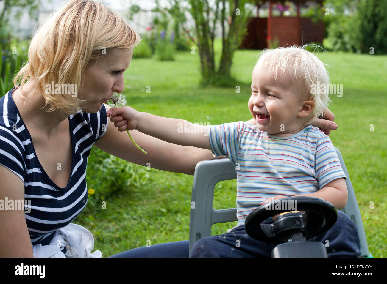 Mother and son having fun outside Stock Photo - Alamy