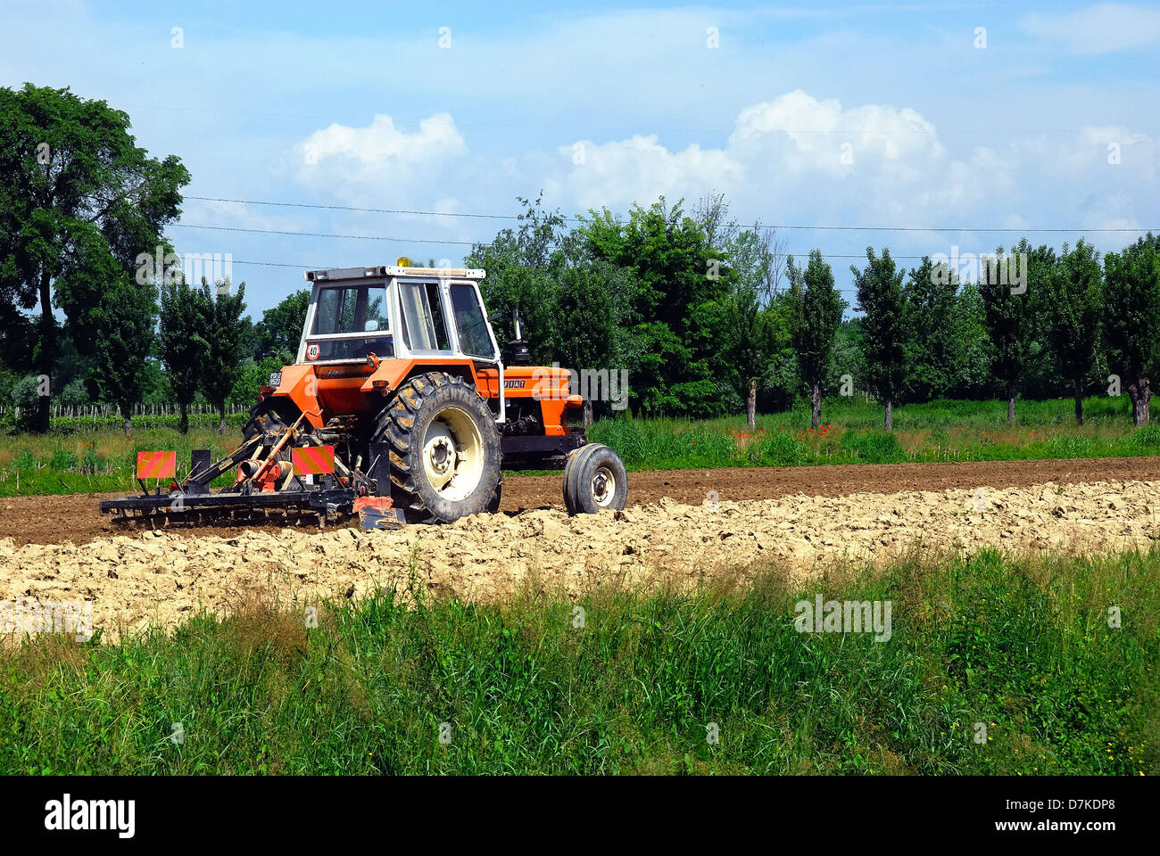 Maize milling tractor hi-res stock photography and images - Alamy