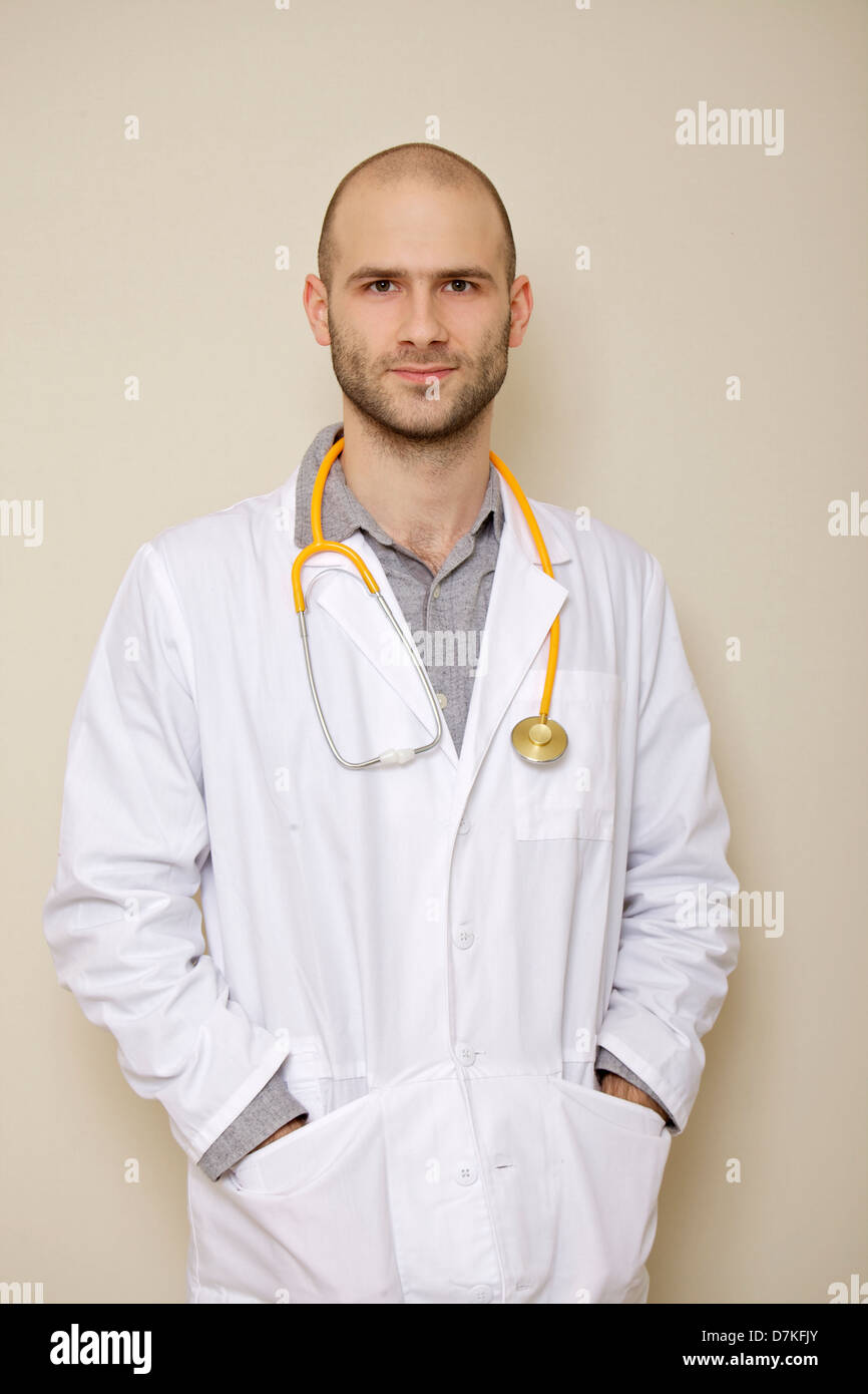 Portrait of a doctor of stethoscope isolated on light background Stock ...
