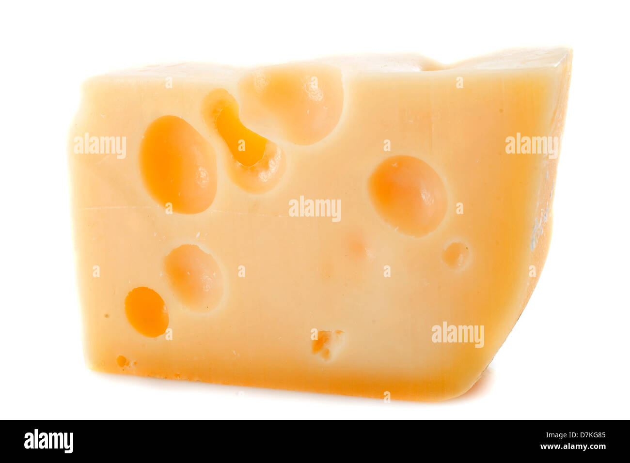 Piece of cheese gruyere in front of white background Stock Photo - Alamy