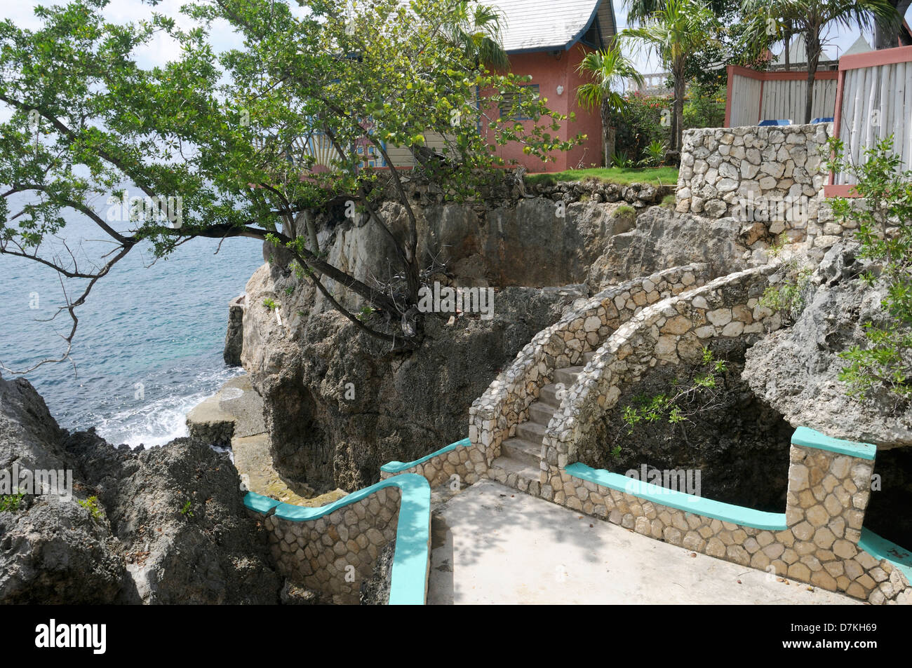 Seaside Cottage and Cliffs at Xtabi Hotel Stock Photo - Alamy
