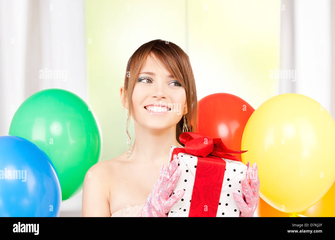 party girl with balloons and gift box Stock Photo - Alamy