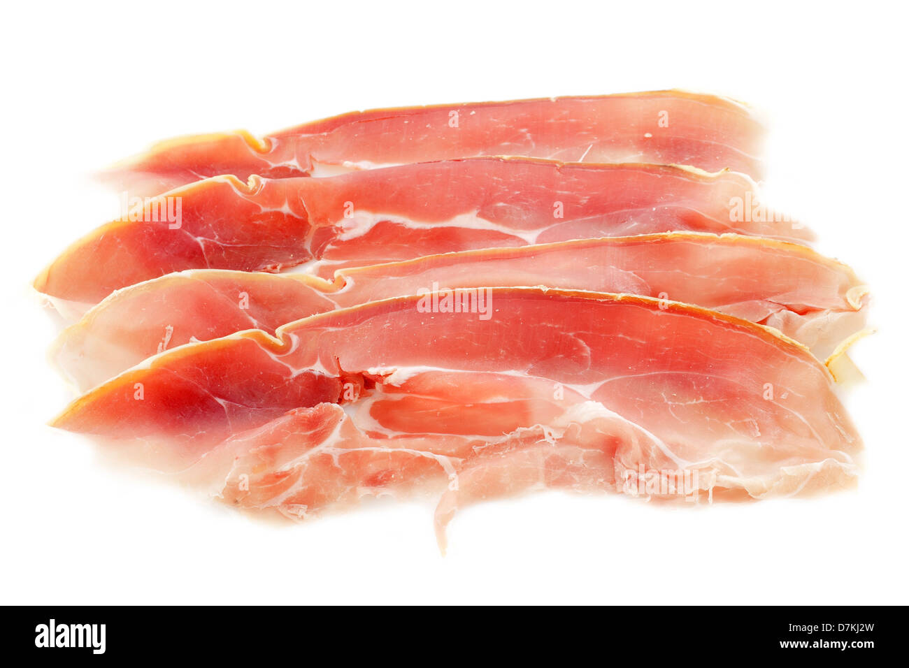 slice of raw ham in front of white background Stock Photo - Alamy