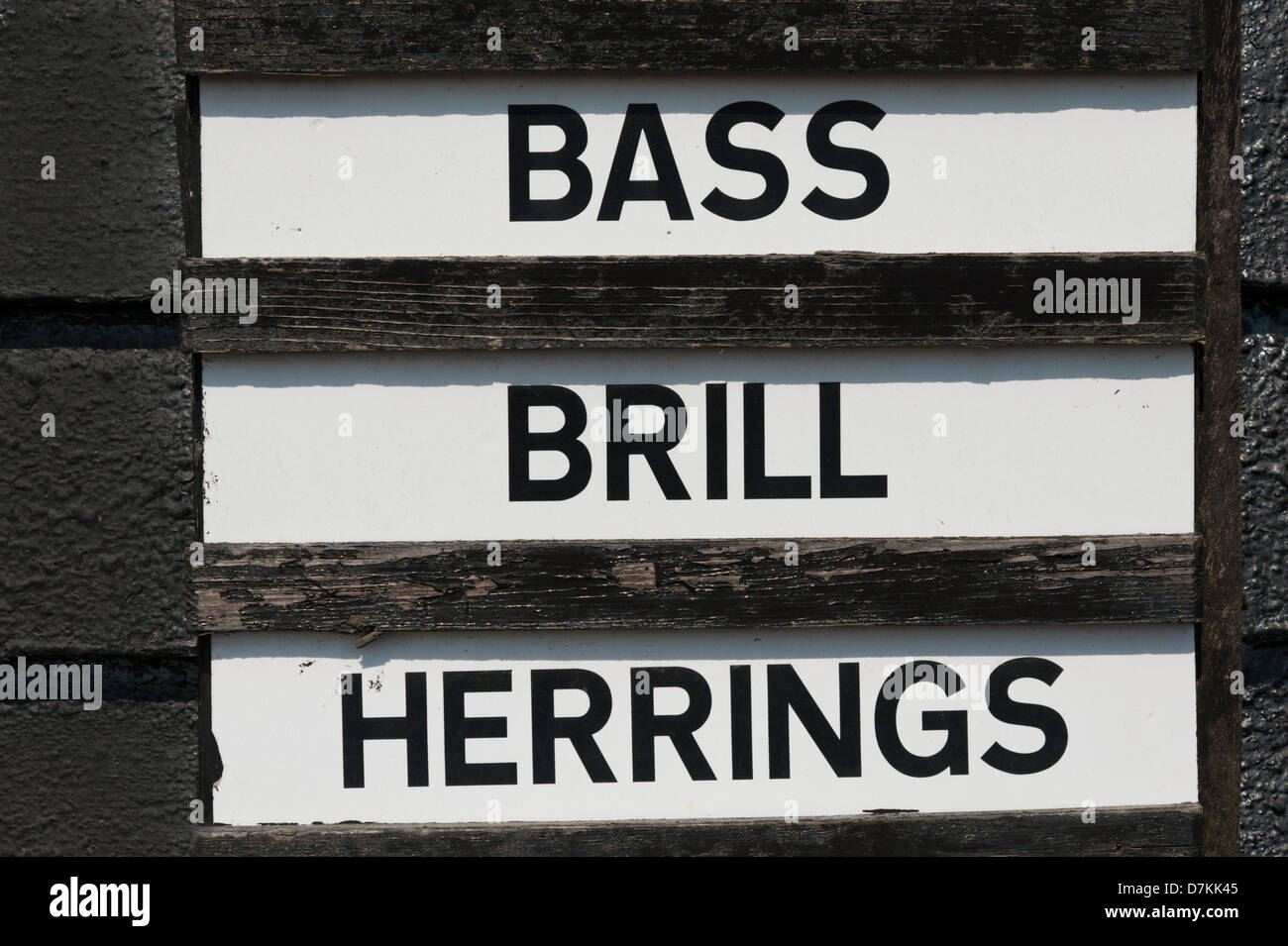 Fish for sale signs and boards outside a fish shop at Southwold Suffolk ...