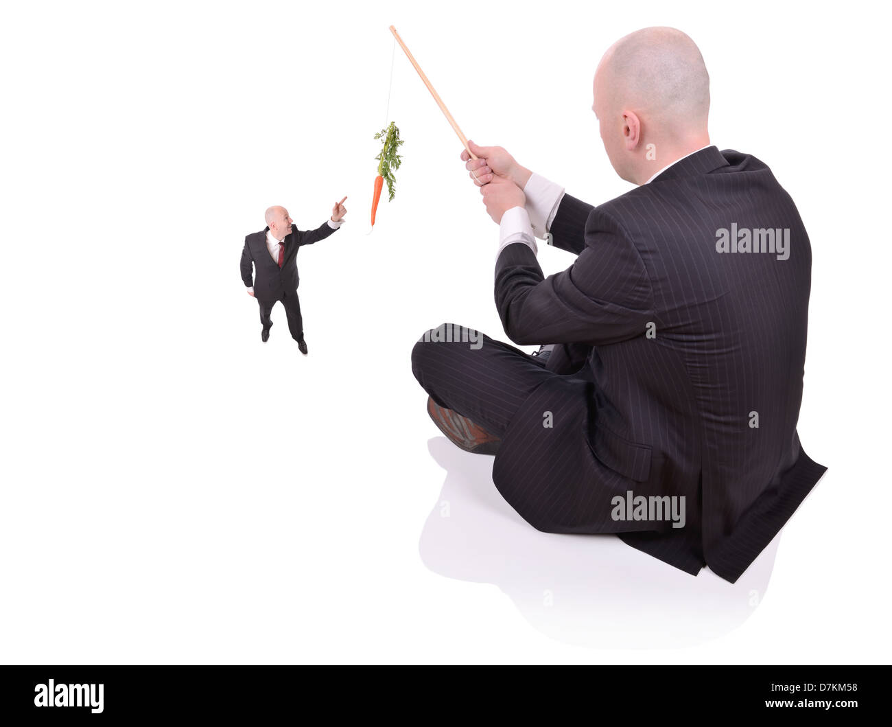 a businessman sat down fishing Stock Photo - Alamy