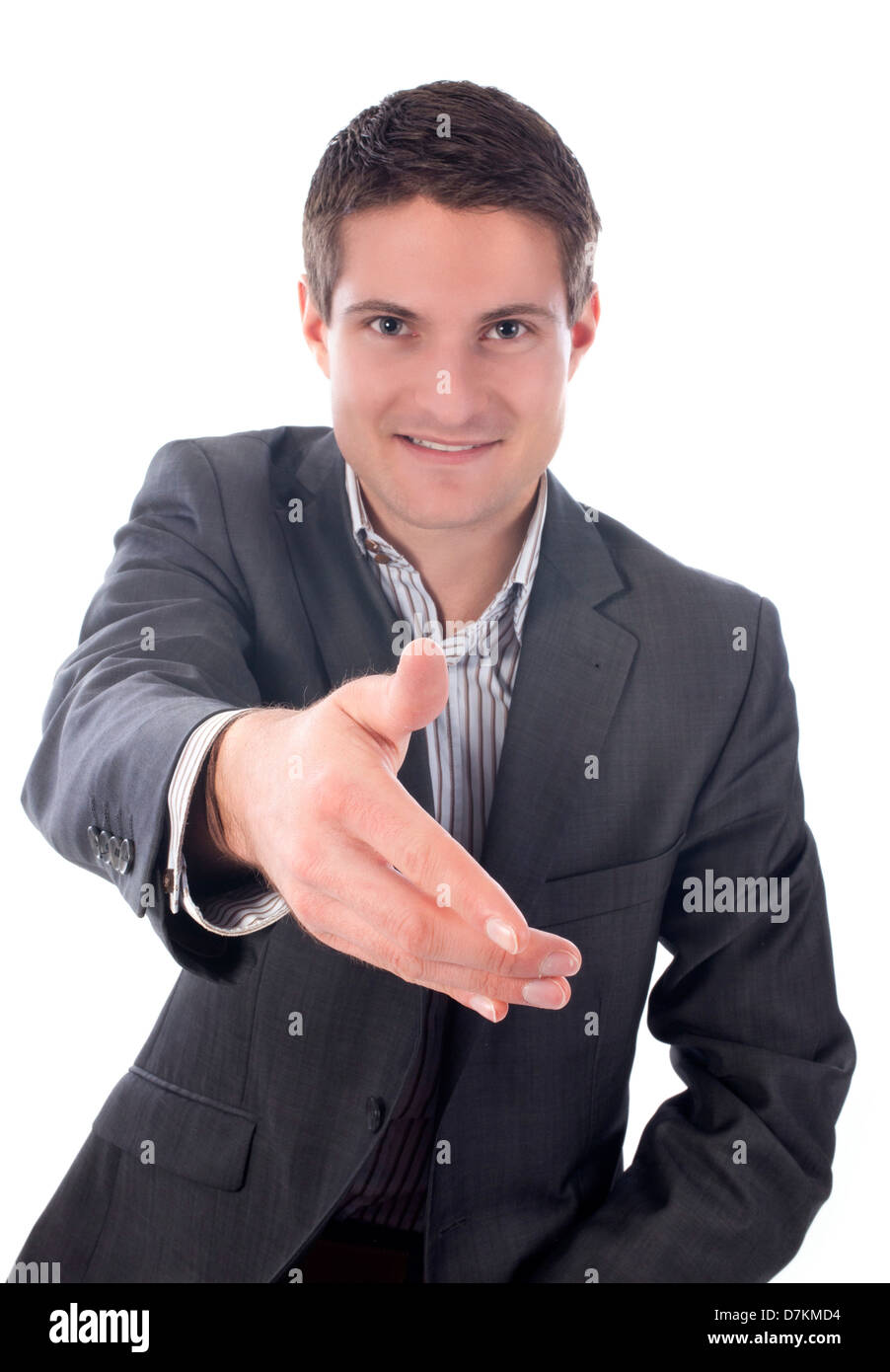 young business man shaking hand in front of white background Stock ...