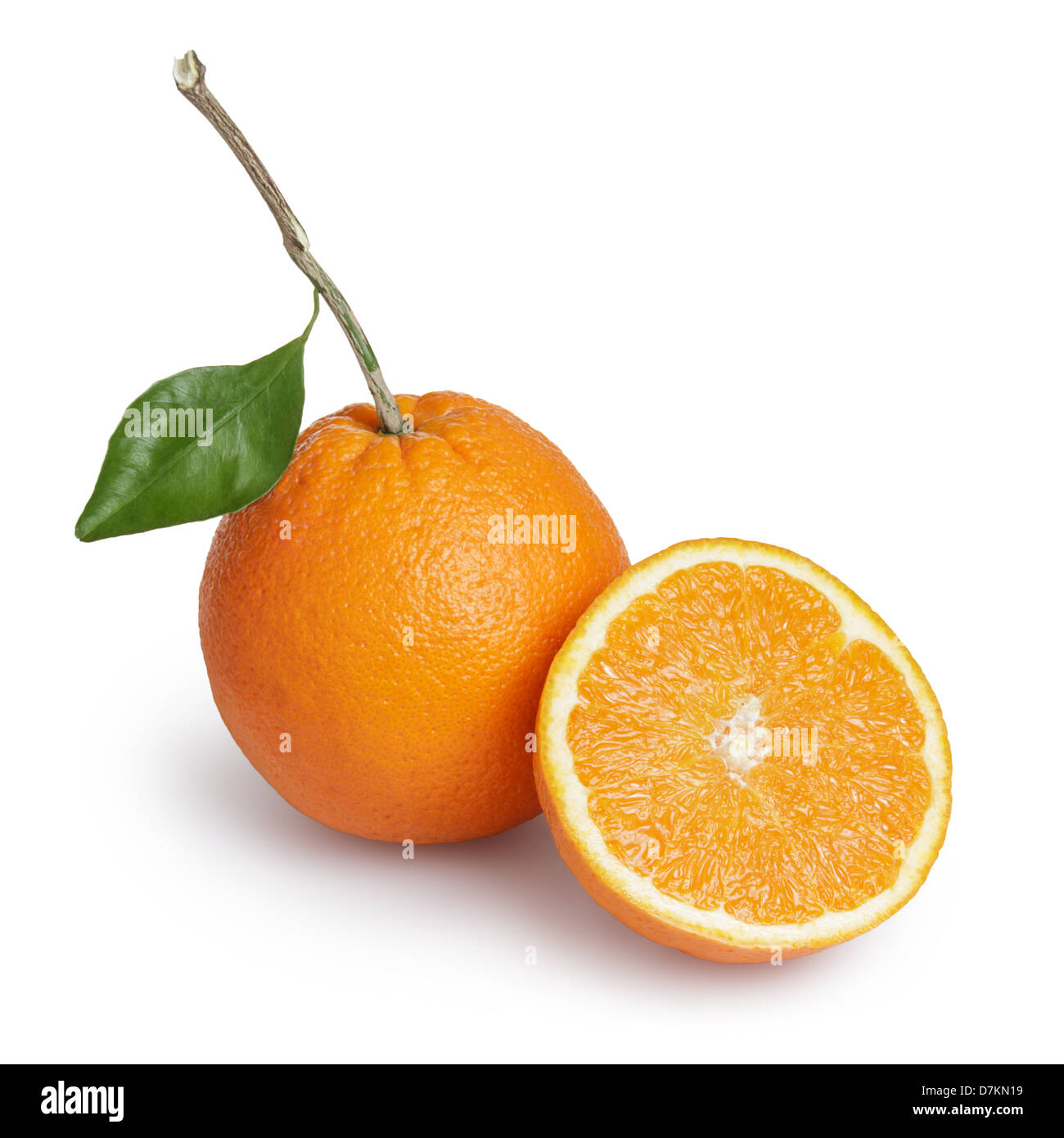 ripe round oranges with half, stem and leaf, isolated on white ...