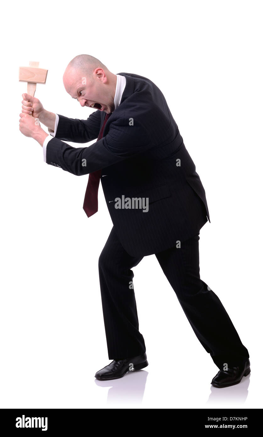 Businessman with wooden mallet hitting against side of image isolated ...