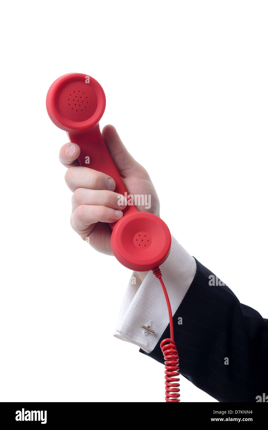 Businessman holding out a red phone receiver Stock Photo - Alamy