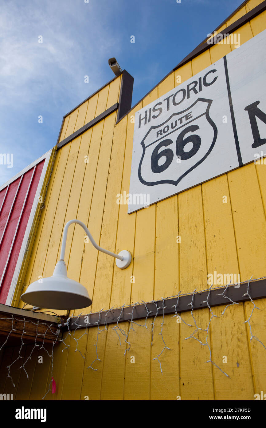 A Historic Route 66 sign on a wooden wall, USA Stock Photo - Alamy