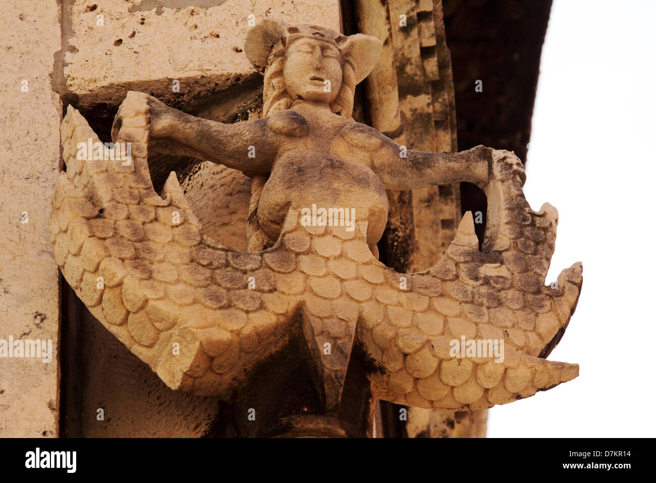 A mermaid like creature on a building in Pula, Croatia Stock Photo - Alamy