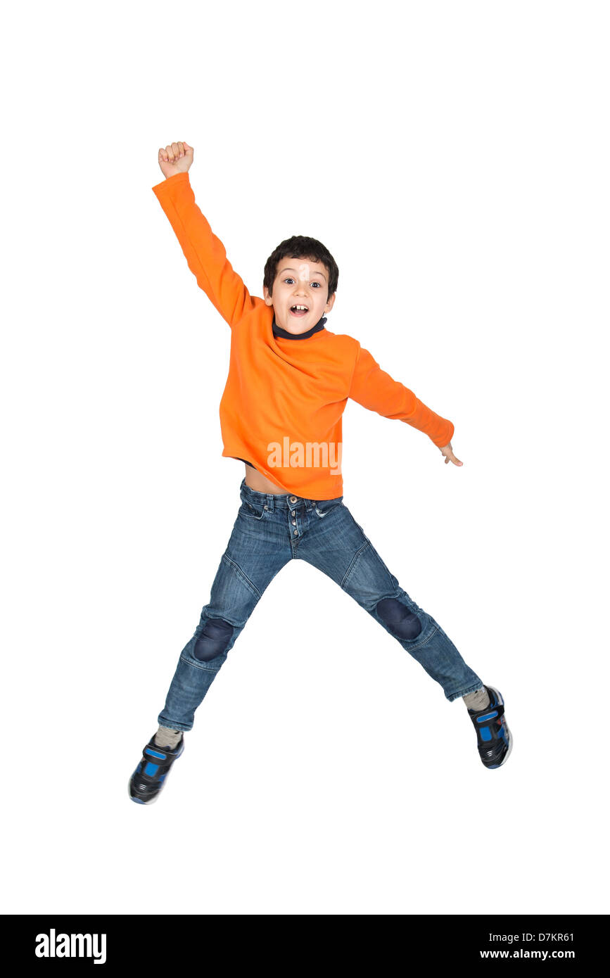 Young boy jumping isolated in white Stock Photo - Alamy