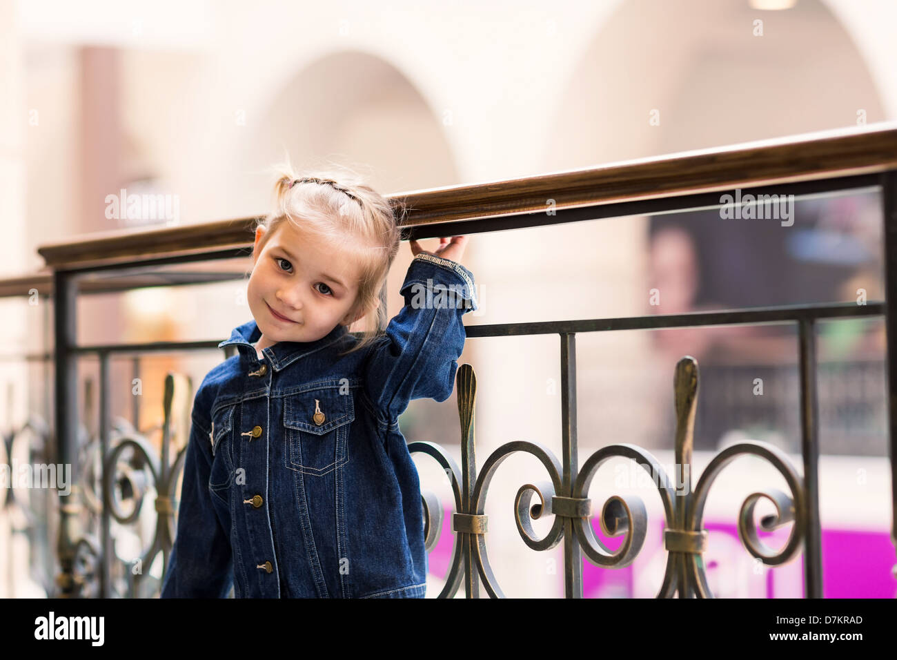 Cute little child in shopping center posing Stock Photo - Alamy