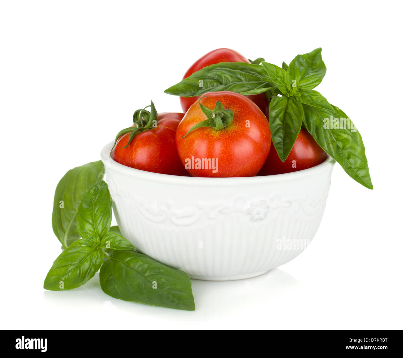 Ripe tomatoes and basil. Isolated on white background Stock Photo - Alamy