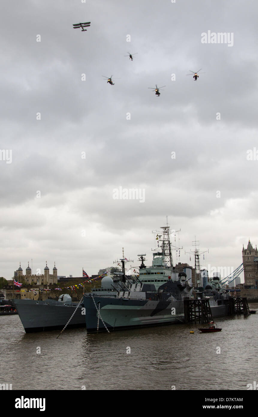 The Royal Navy flypast passes over museum ship HMS Belfast and current ...