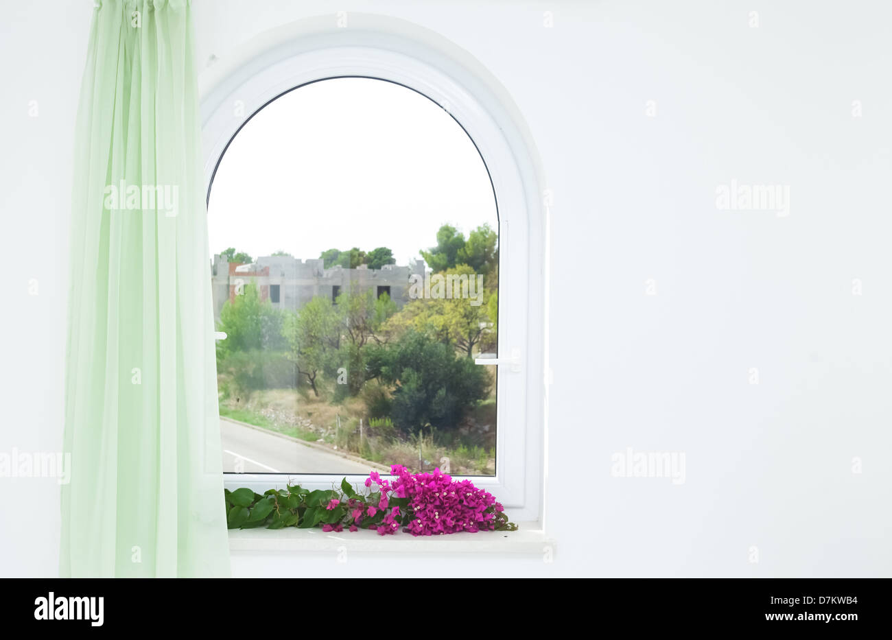 Arched window in house with view Stock Photo - Alamy