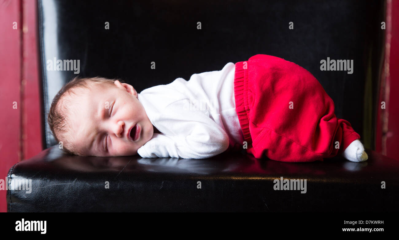 baby sleeping on chair 4 Stock Photo - Alamy
