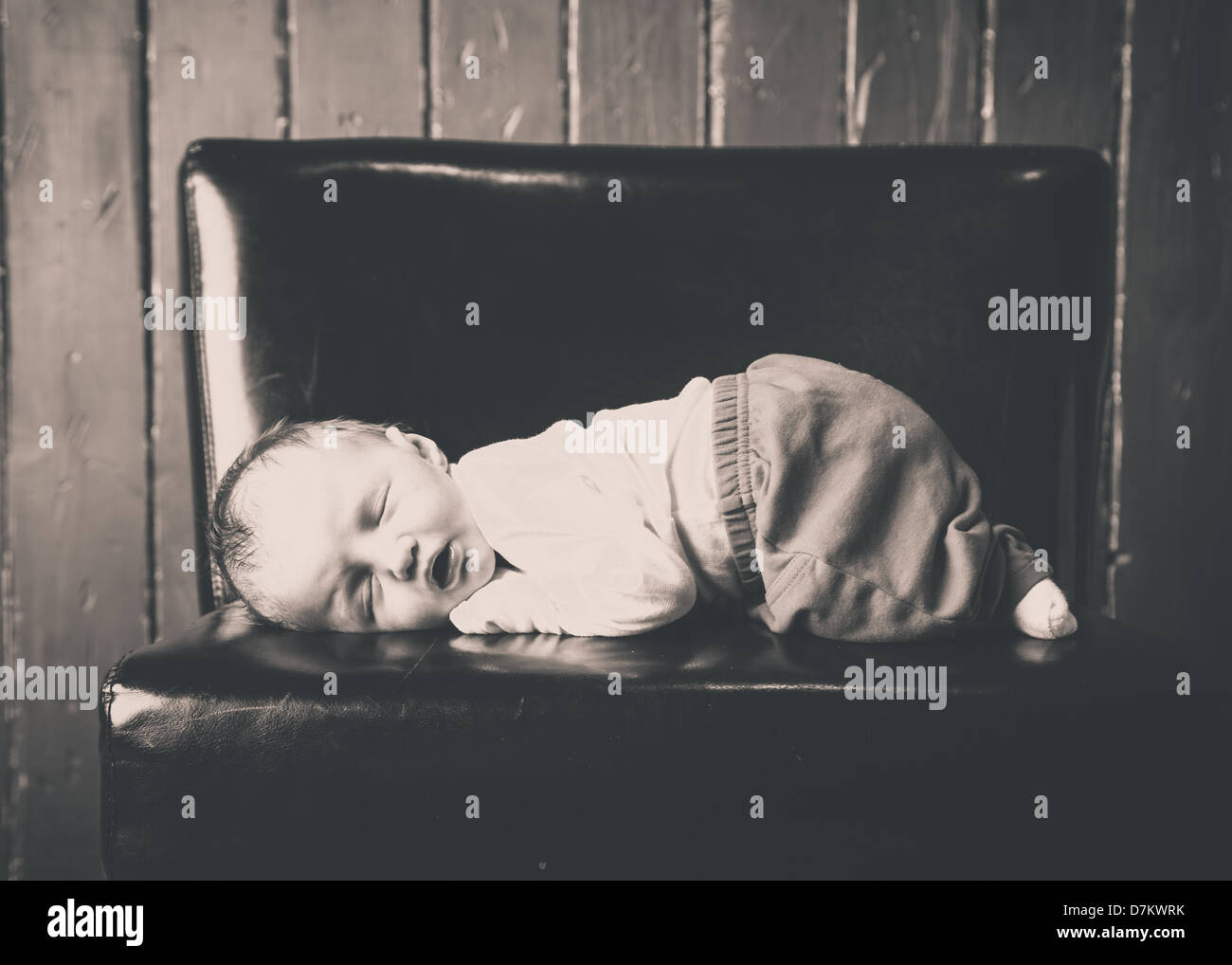 Baby Sleeping on Chair 3 Stock Photo - Alamy