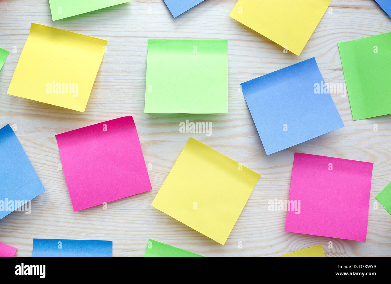 Colorful sticky notes on wooden background Stock Photo - Alamy