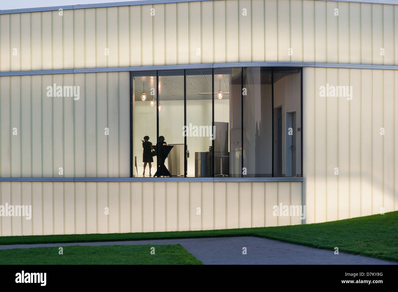 Silhouette of two women seen through a glass window. Bloch Building ...
