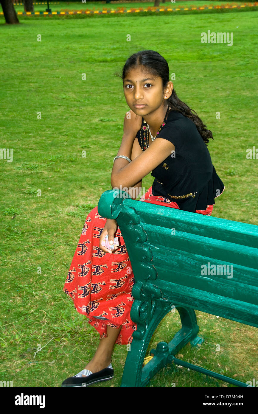 Indian Girl Sitting On Bench Stock Photos & Indian Girl Sitting On ...