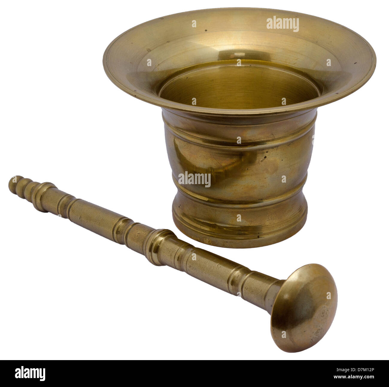 Ancient brass pestle. Isolated on white background Stock Photo - Alamy