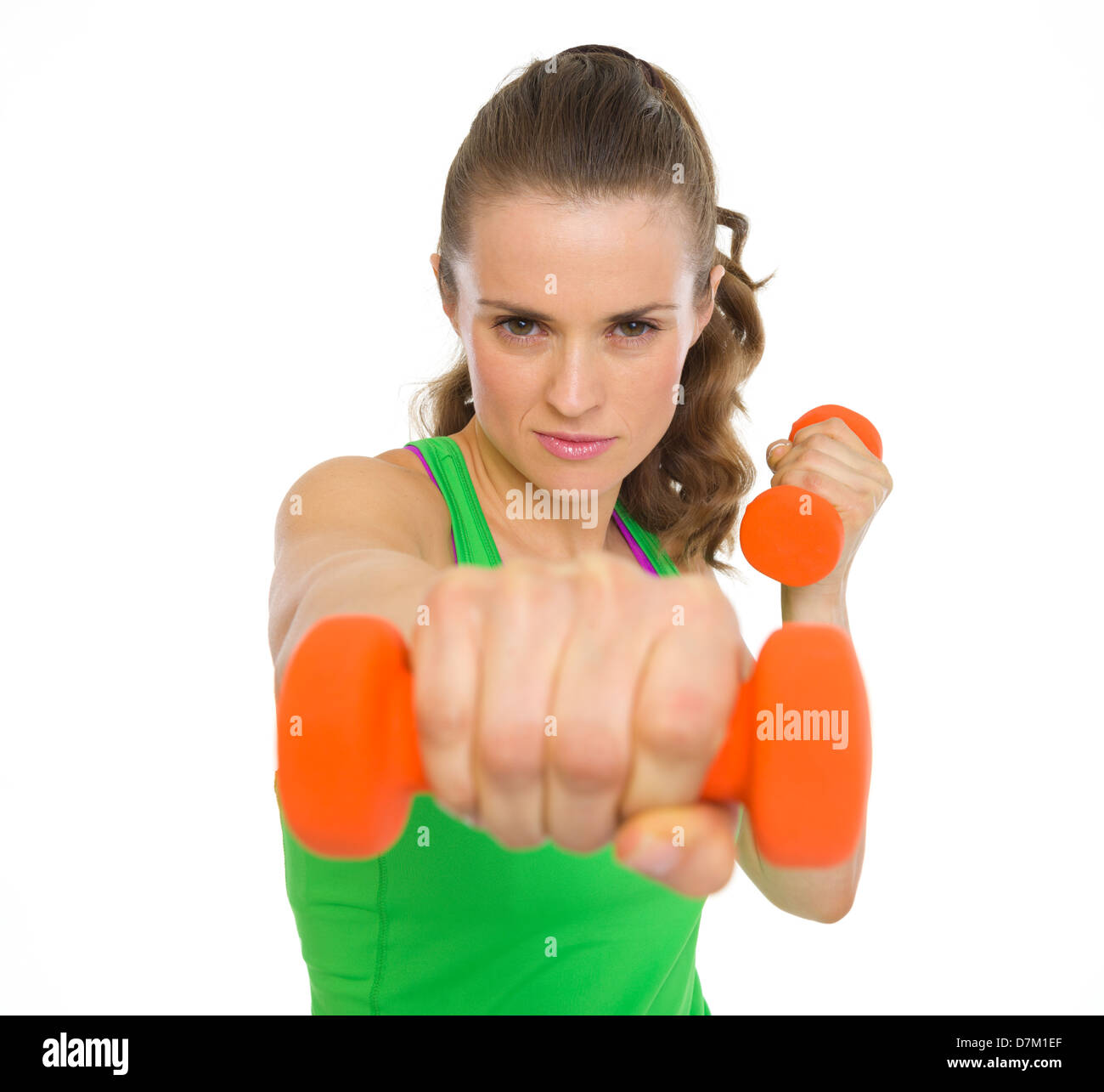 Fitness young woman making exercise with dumbbells Stock Photo - Alamy