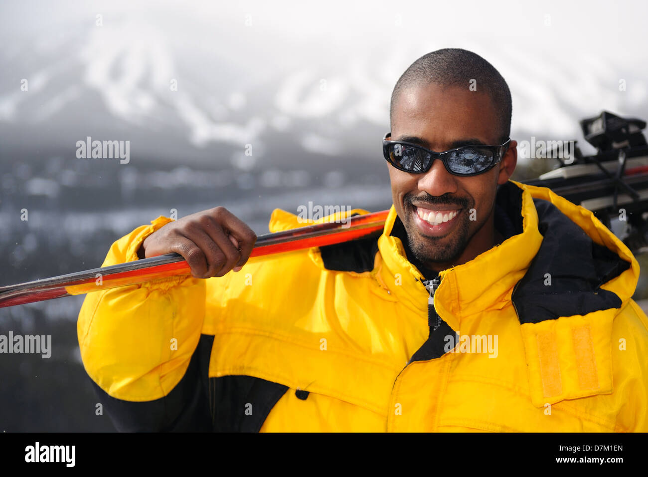 African American Man On a Vacation at Ski Resort Stock Photo - Alamy